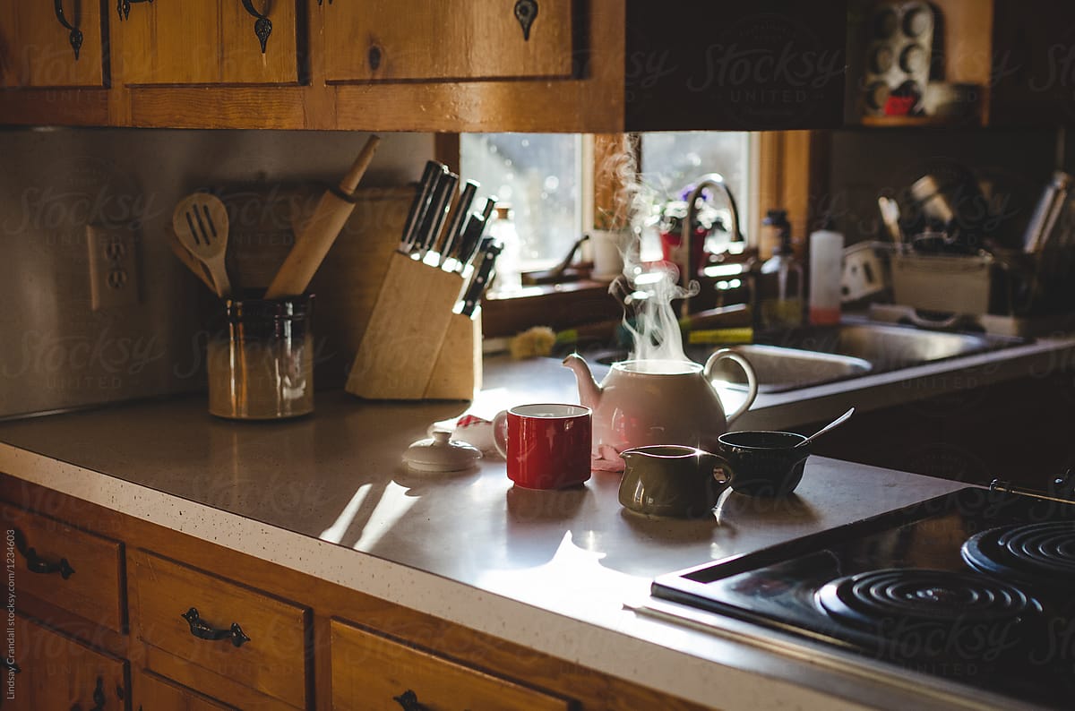 "Teapot With Steaming Tea On A Kitchen Counter" by Stocksy Contributor ...