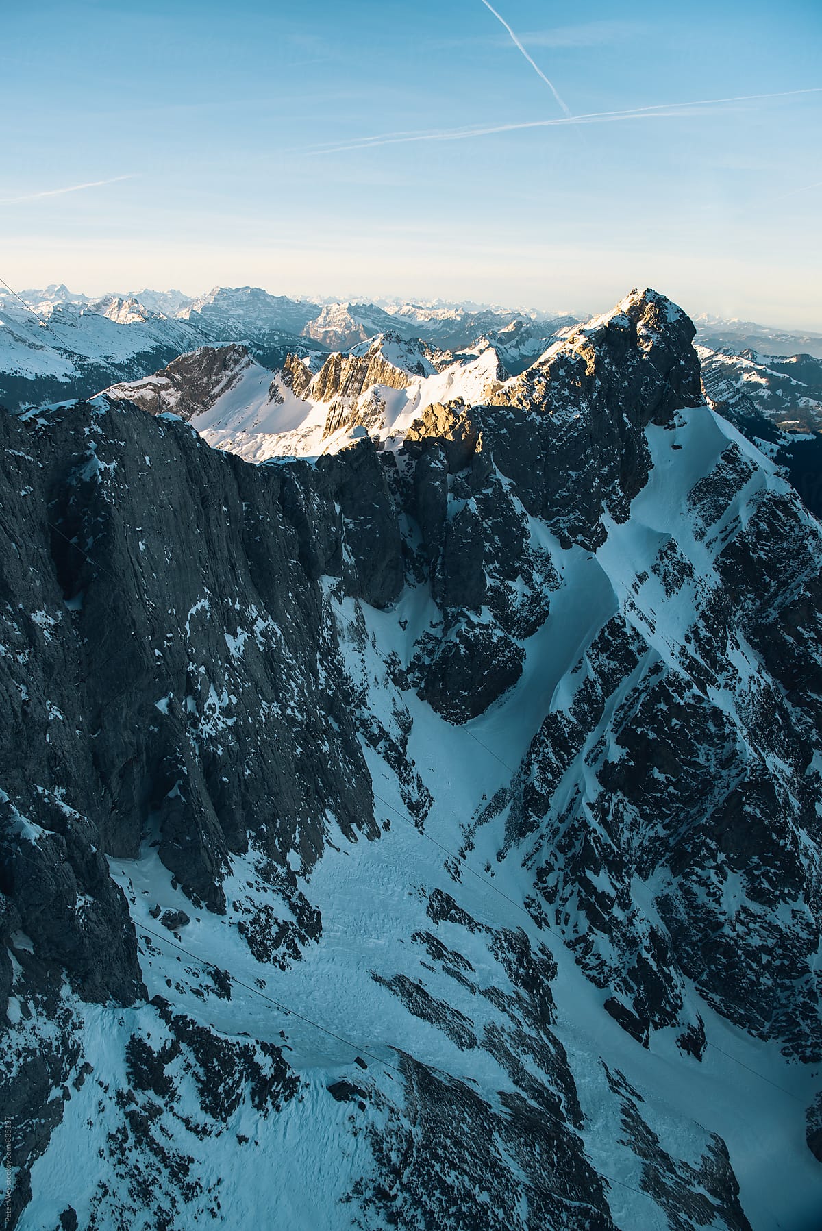 "Mountain Cliff" by Stocksy Contributor "Peter Wey" - Stocksy