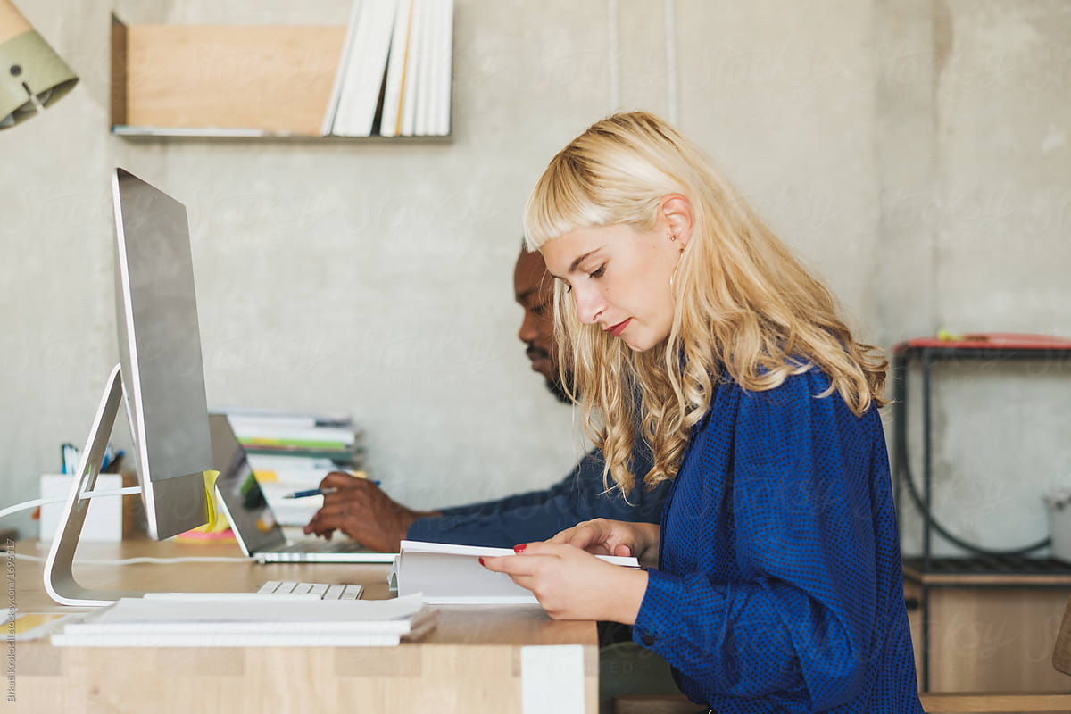 "Young Blond Woman Working At The Office" by Stocksy Contributor "B ...