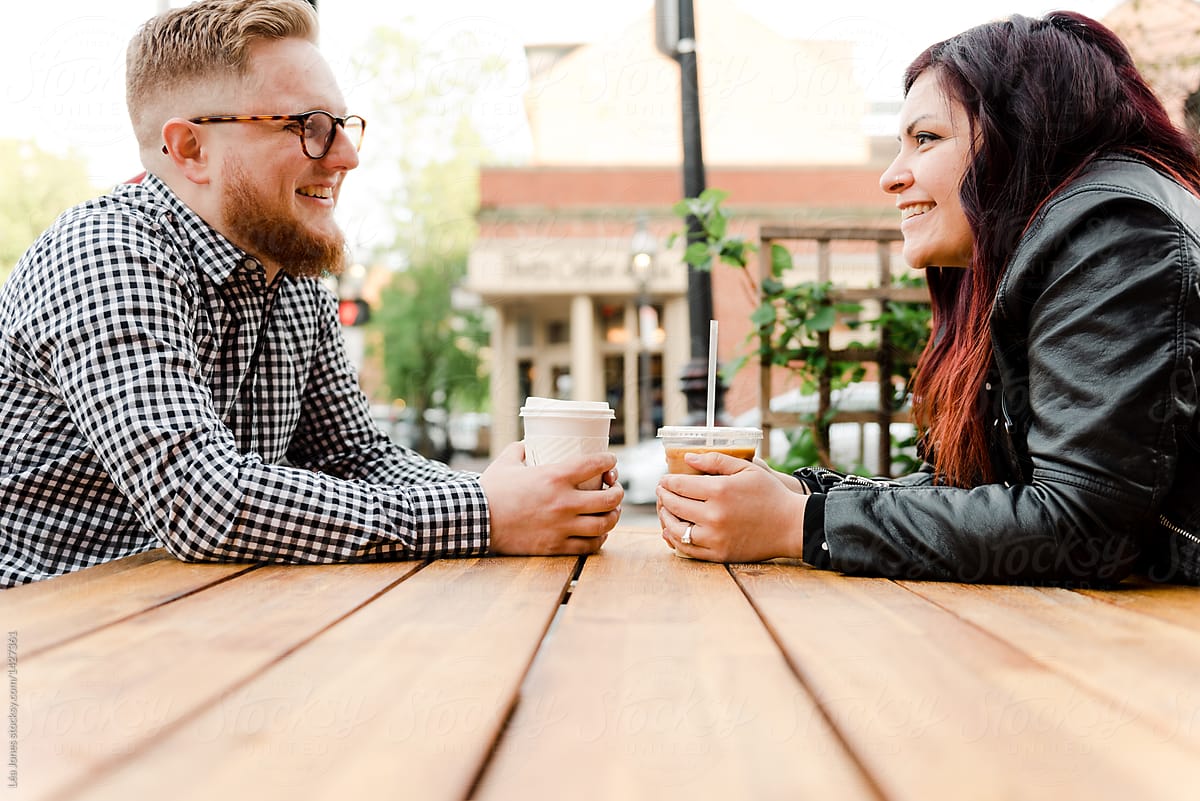 "Couple Having Coffee And Pastries In Cafe" by Stocksy Contributor "Lea ...