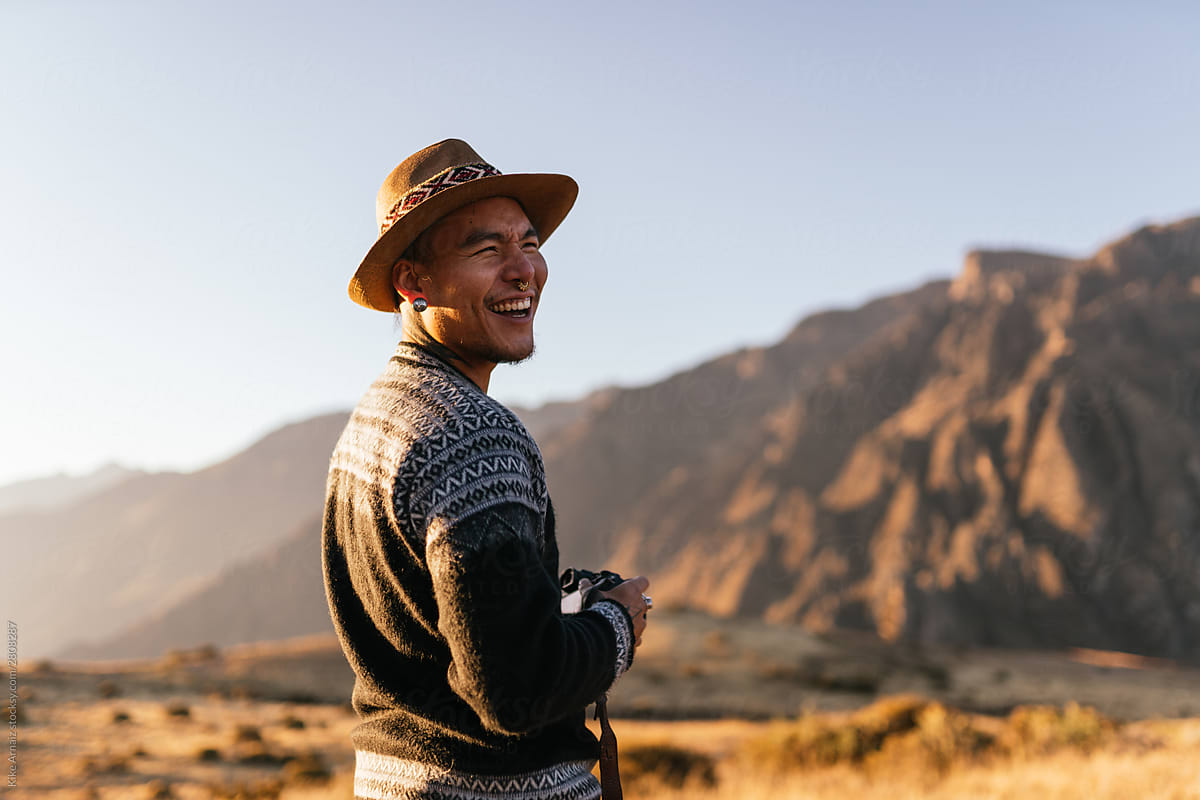 "Asian Man In The Mountains" by Stocksy Contributor "Kike Arnaiz" - Stocksy