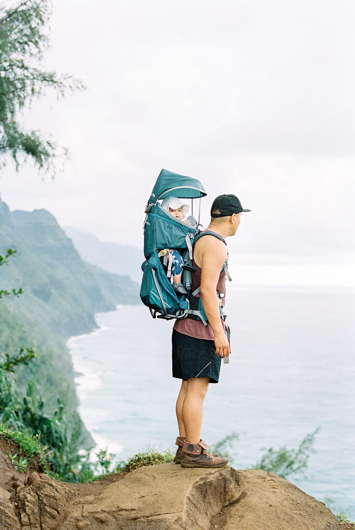 "Young Dad Hiking With Baby In Hawaii" by Stocksy Contributor "Daniel ...