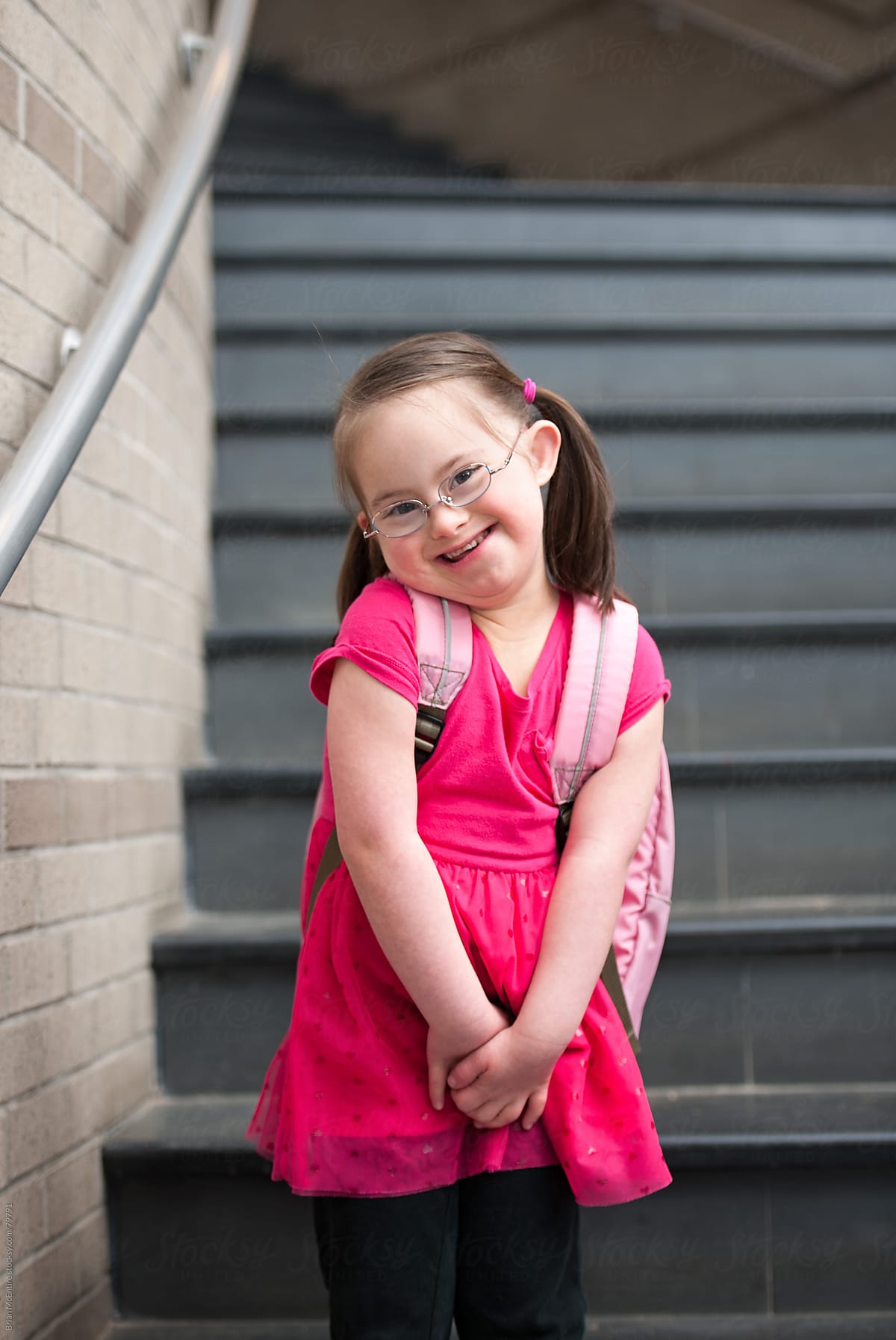 Exuberant Little Girl With Down Syndrome Smiling In School By Stocksy Exuberant Little Girl With Down Syndrome Smiling In School By Stocksy