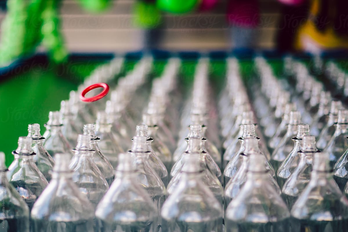 "Bottle Toss Game At A Carnival" by Stocksy Contributor "Kristen ...