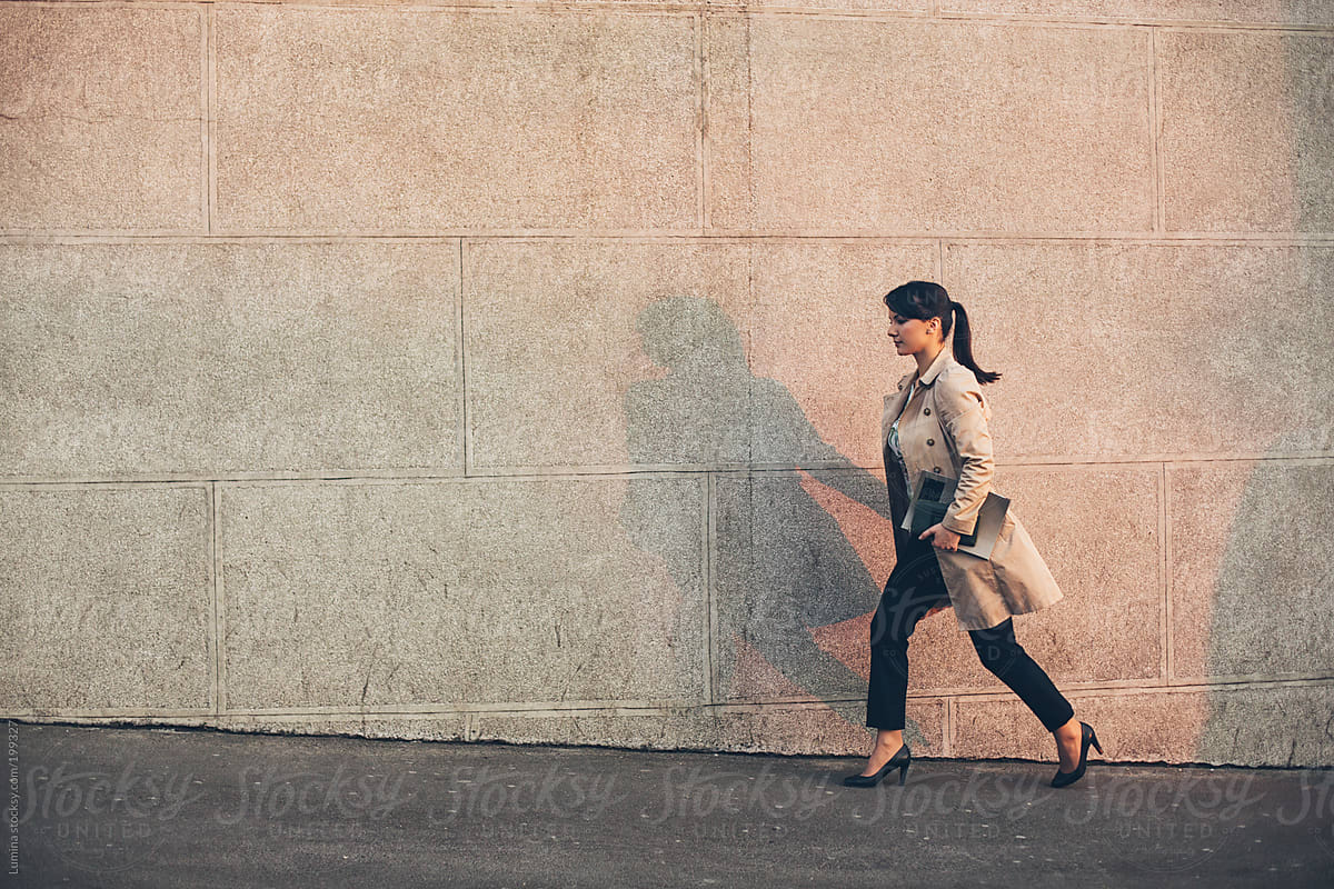 "Businesswoman Going To Work" by Stocksy Contributor "Lumina" - Stocksy