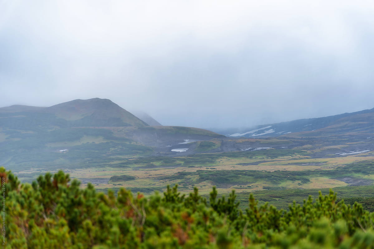 Foggy landscape at the foot of Mutnovsky volcano, Kamchatka, Russia ...