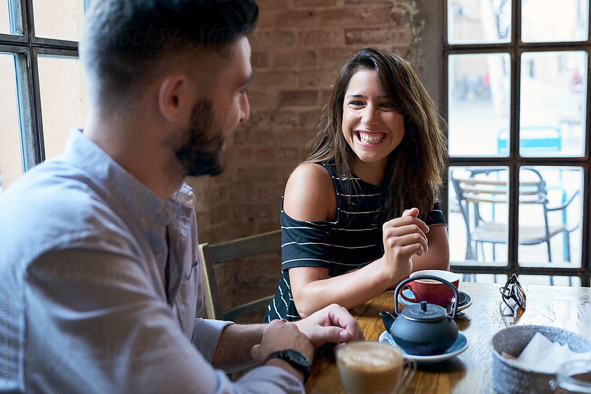 "Couple Laughing Happily" by Stocksy Contributor "Guille Faingold ...