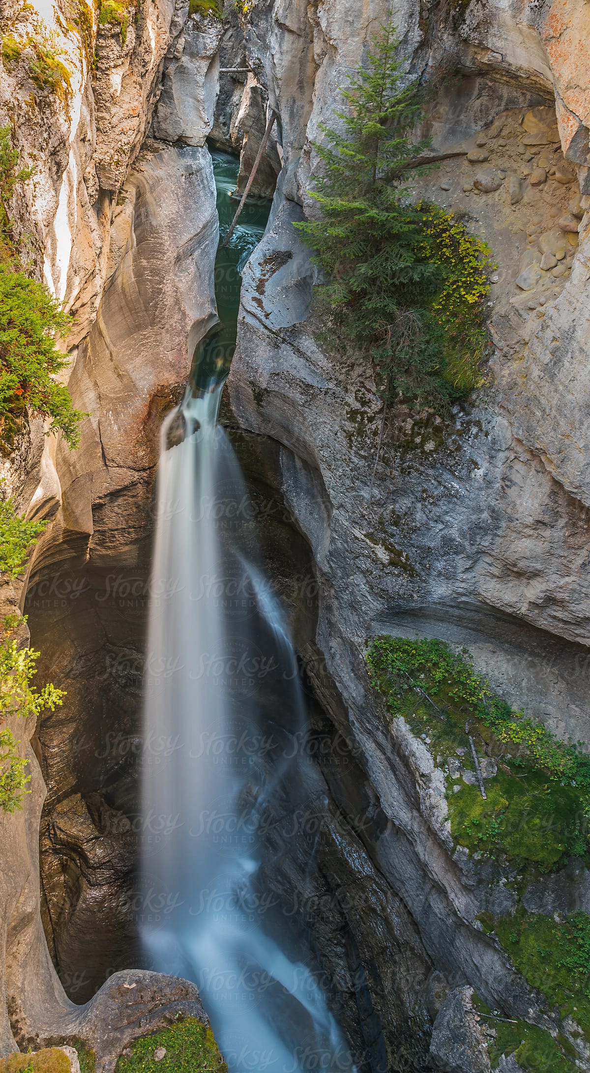 "Waterfall In Maligne Canyon" by Stocksy Contributor "Matt Watson ...