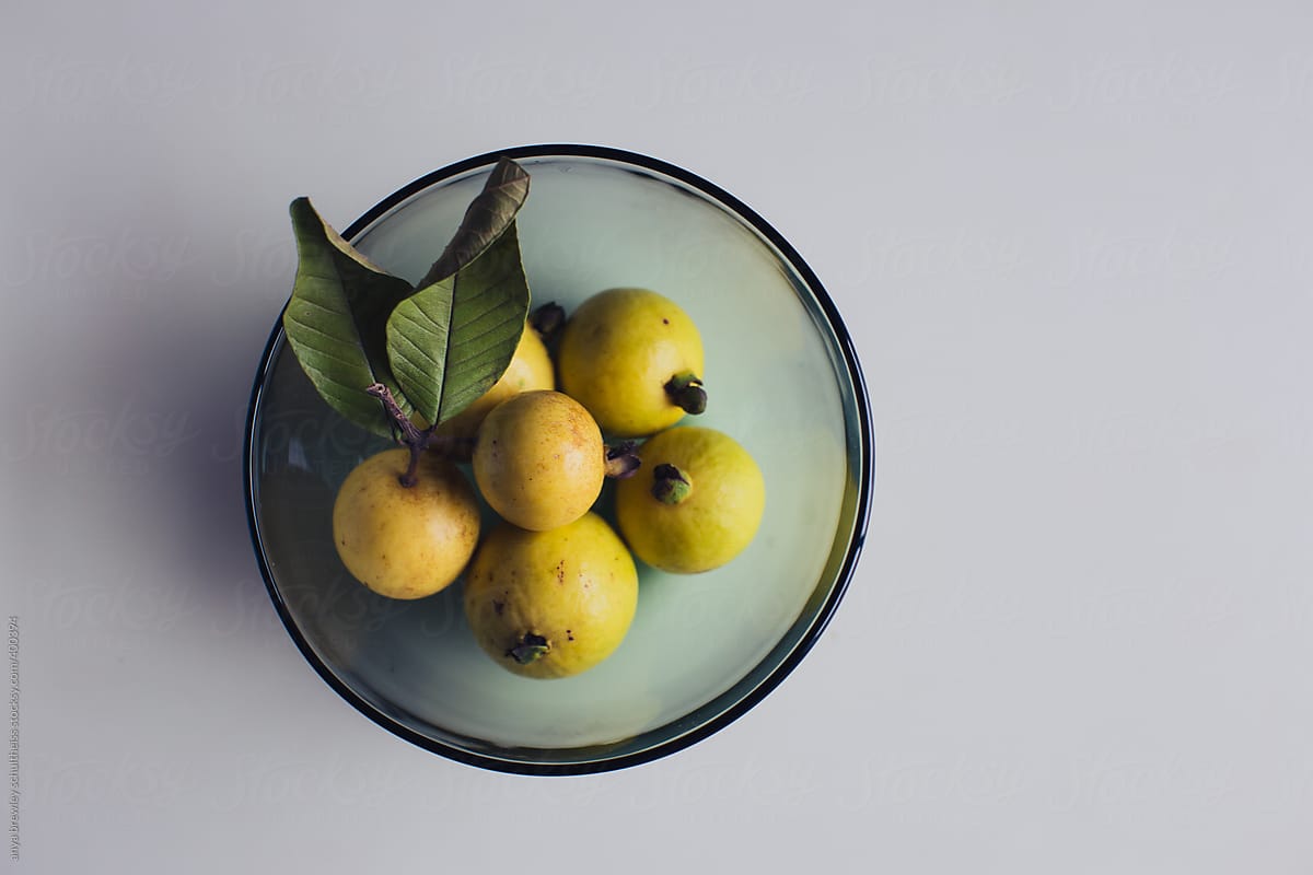"Bowl Full Of Bright Yellow Guava Fruit" by Stocksy Contributor "Anya ...