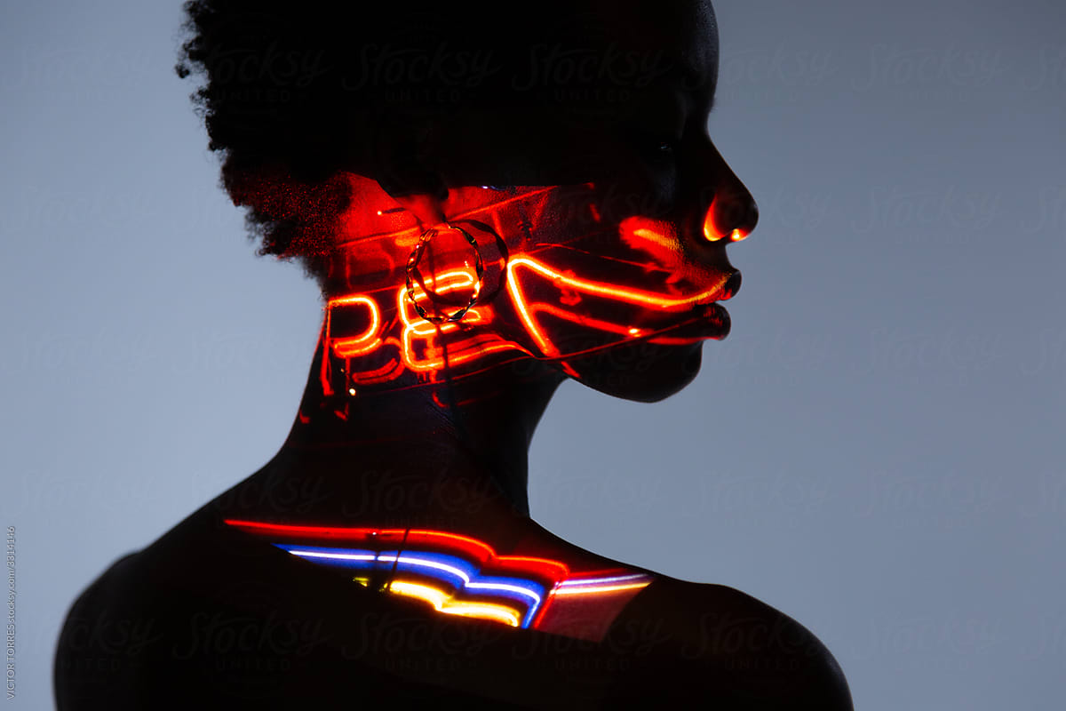"Afro Woman's Back Posing In The Studio" by Stocksy Contributor "VICTOR ...