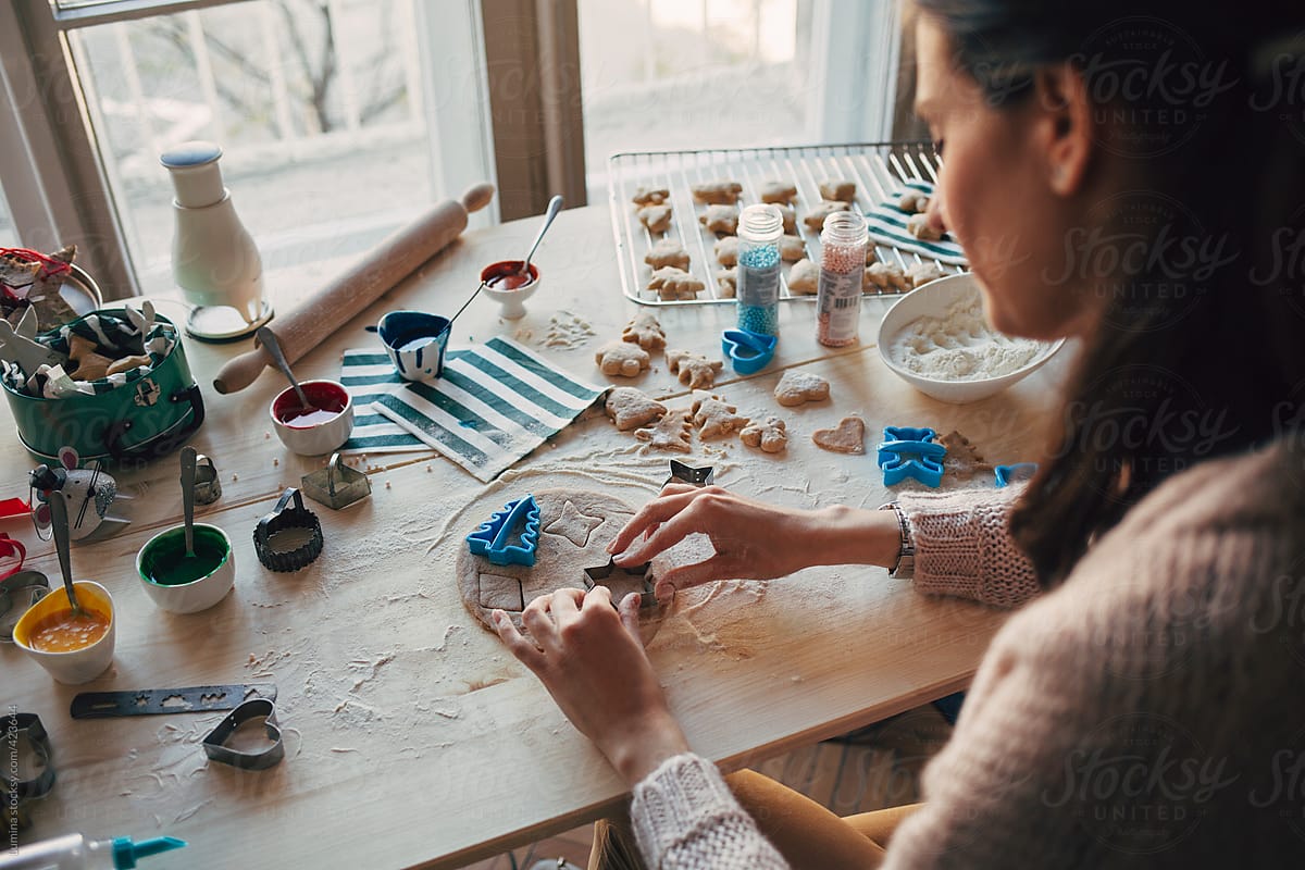 "Woman Making Christmas Cookies" by Stocksy Contributor "Lumina" - Stocksy