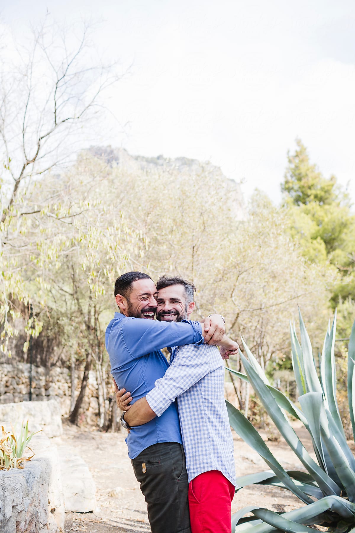 "T\Two Men In Love Hugging Each Other Happy" by Stocksy Contributor ...