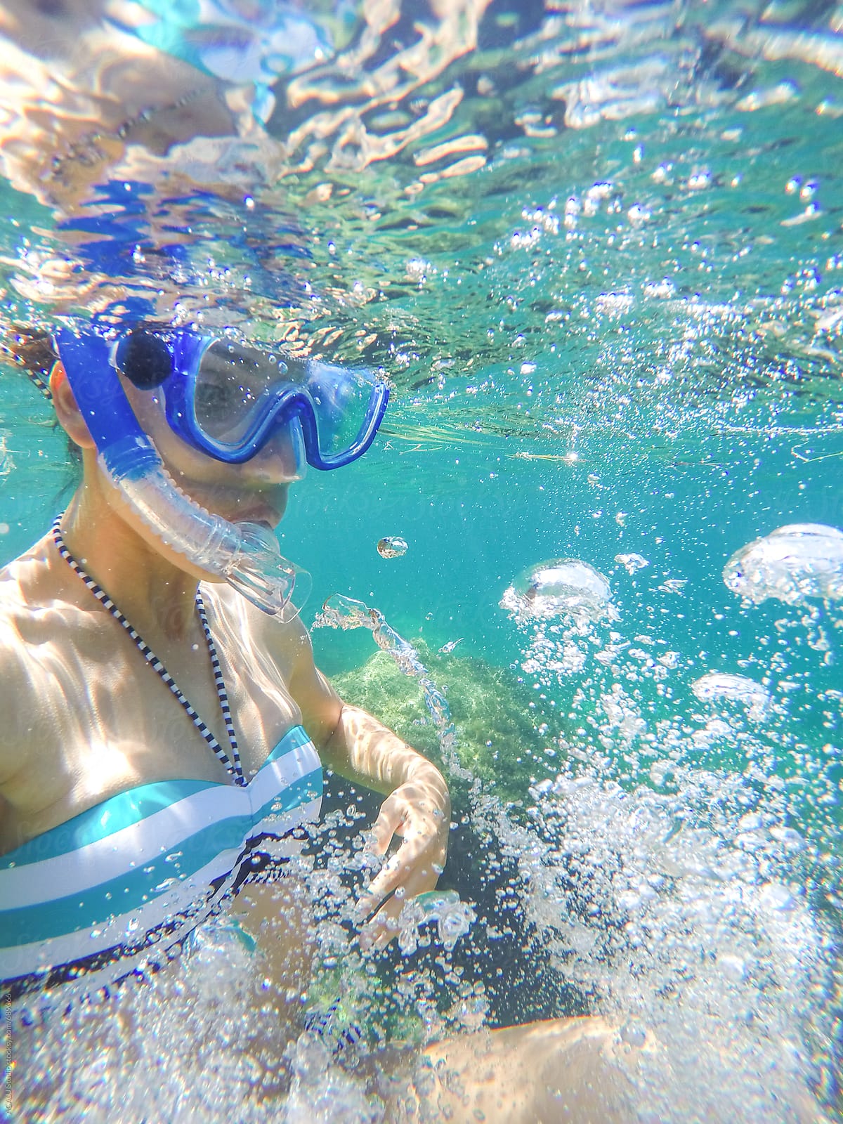 "Young Woman Snorkeling In Crystal Clear Waters" by Stocksy Contributor ...