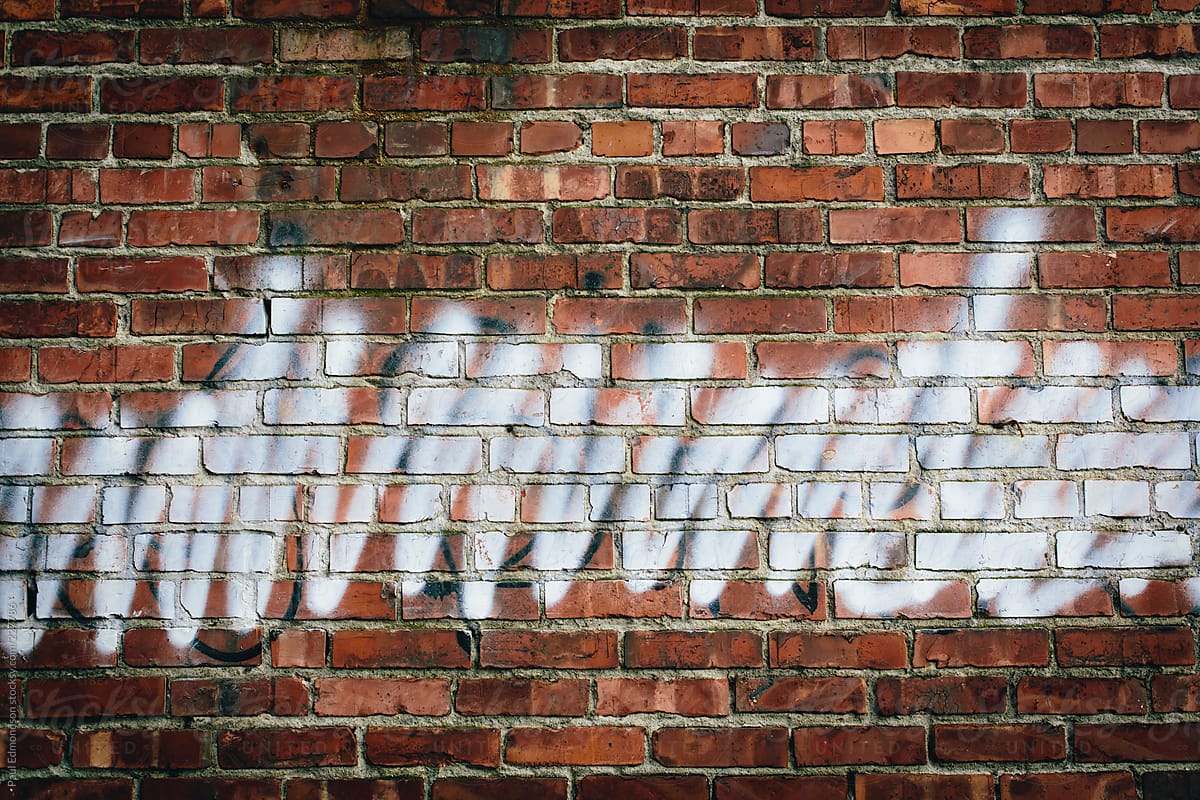 "Graffiti On Brick Building Wall" by Stocksy Contributor "Rialto Images ...