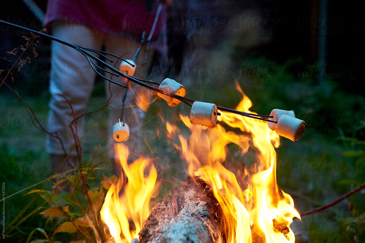 "Roasting Marshmallows" by Stocksy Contributor "Jeff Wasserman" - Stocksy