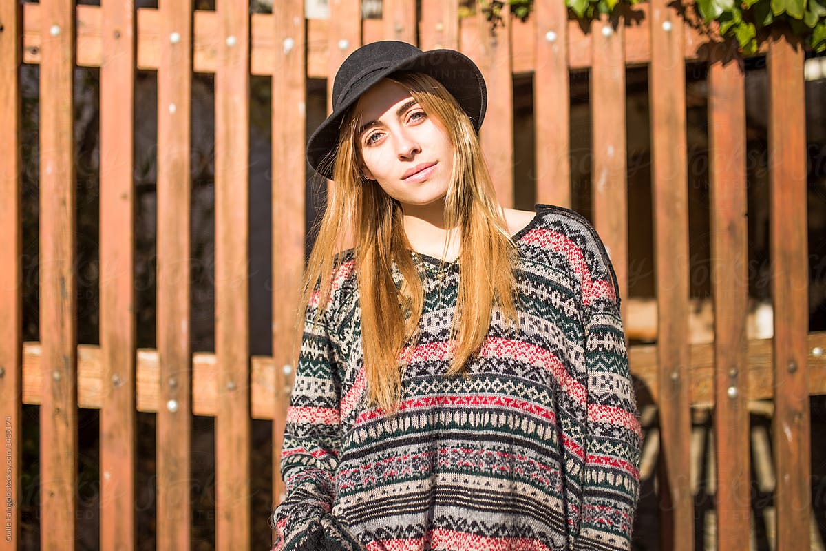 "Woman With Hat" by Stocksy Contributor "Guille Faingold" - Stocksy