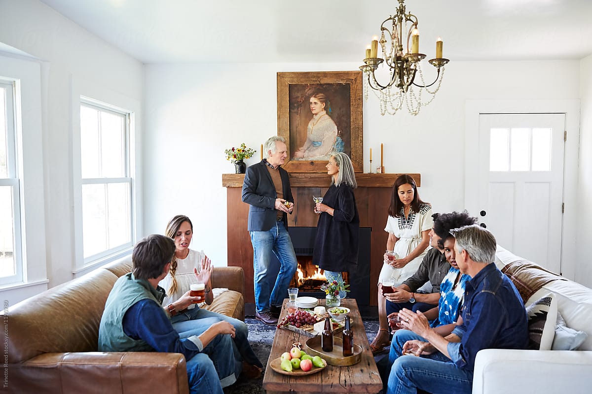 "Group Of Friends And Family Having A Cocktail Party In Their Home" by ...