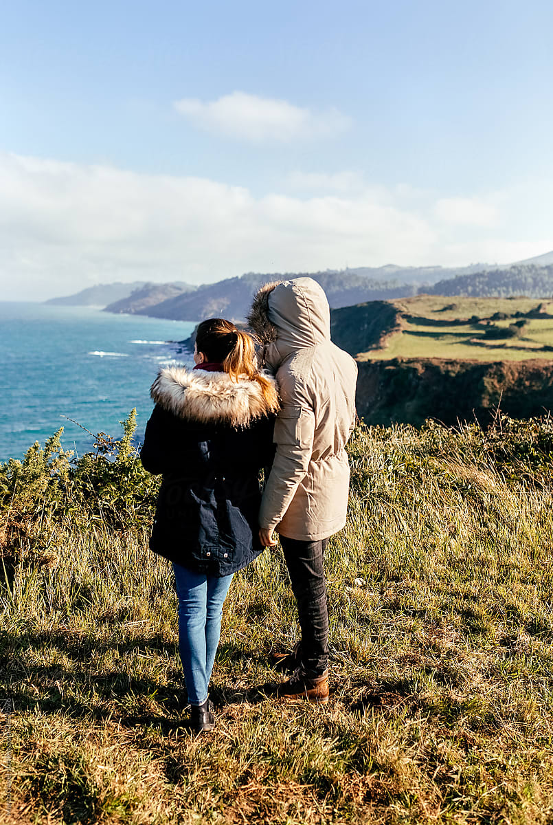 "Couple Observing The Views" by Stocksy Contributor "Marco Govel" - Stocksy