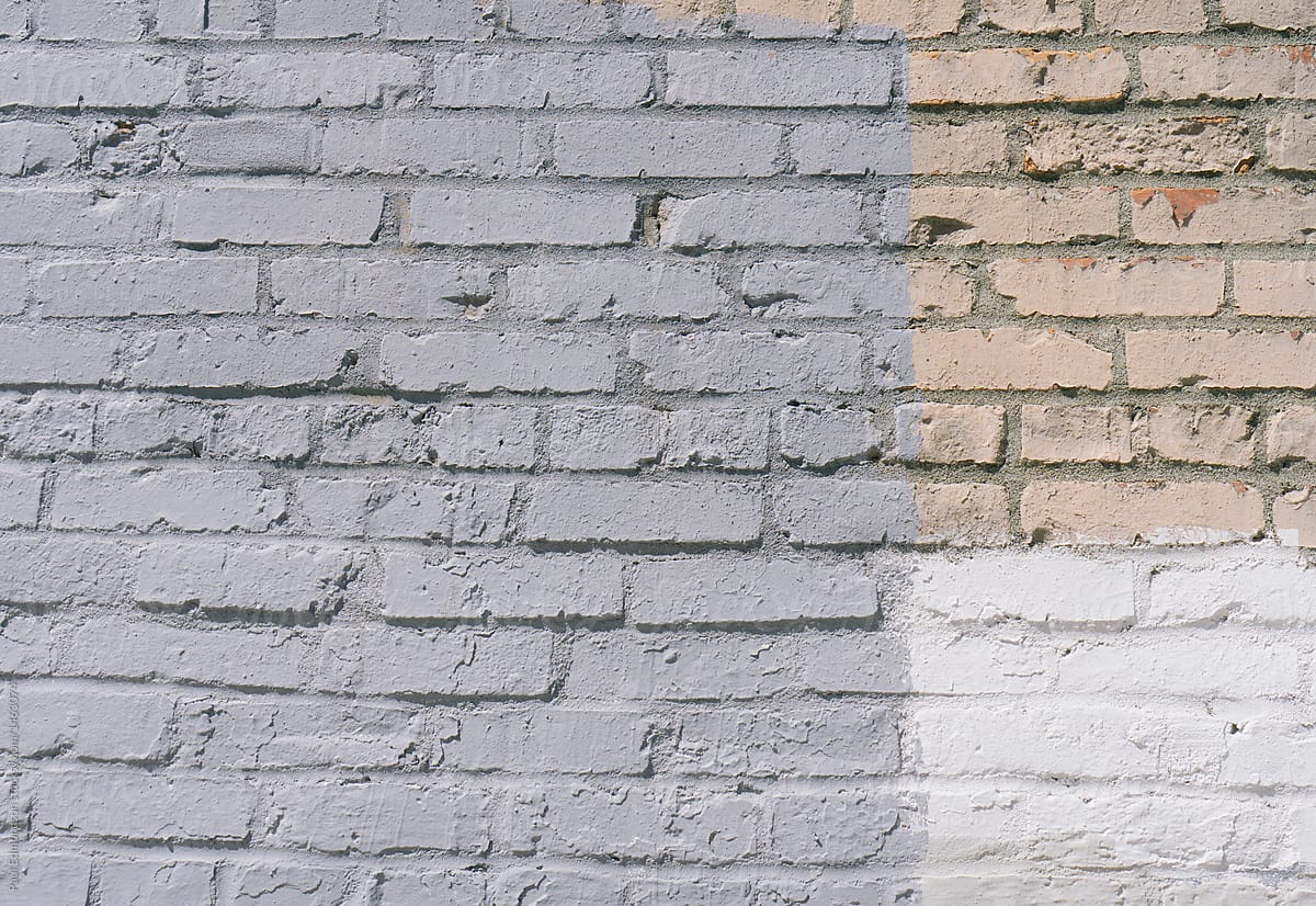 "Paint Covering Graffiti Tags On Brick Wall" by Stocksy Contributor ...