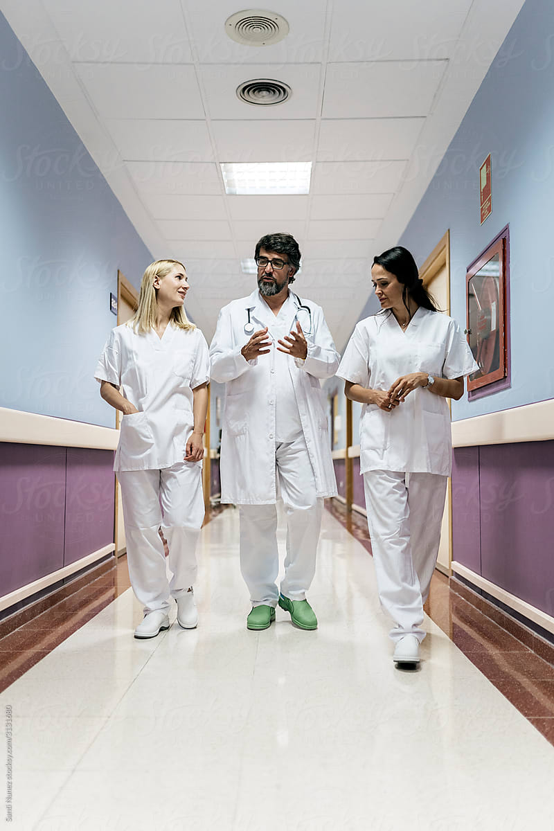 "Medical Teamwork Working In A Hospital" by Stocksy Contributor "Santi ...