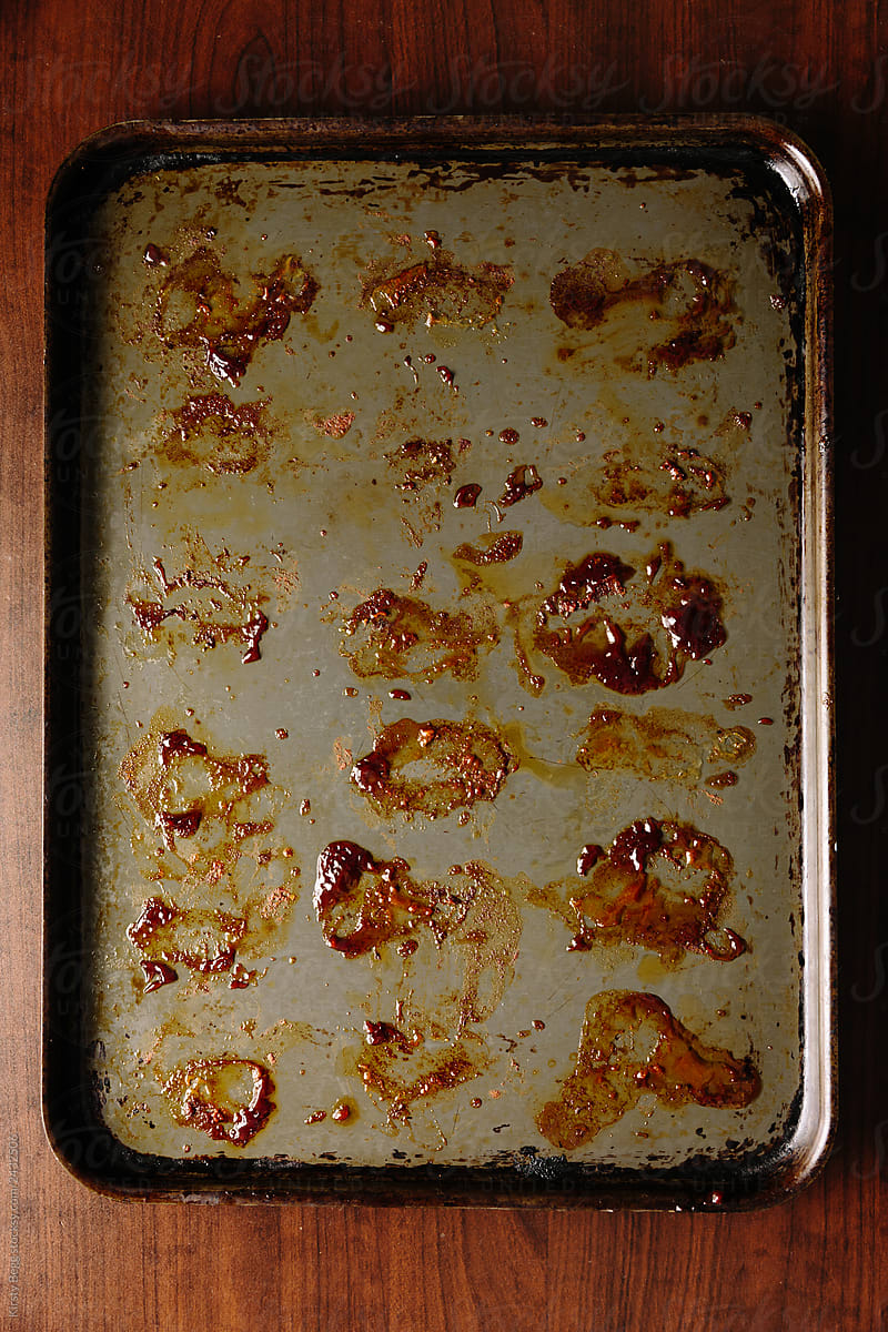 "Dirty Baking Tray With Sauce From Chicken Wings" by Stocksy ...