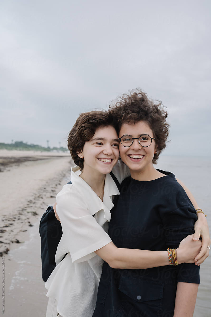 "Non Binary Couple In The Beach" by Stocksy Contributor "Hernandez ...