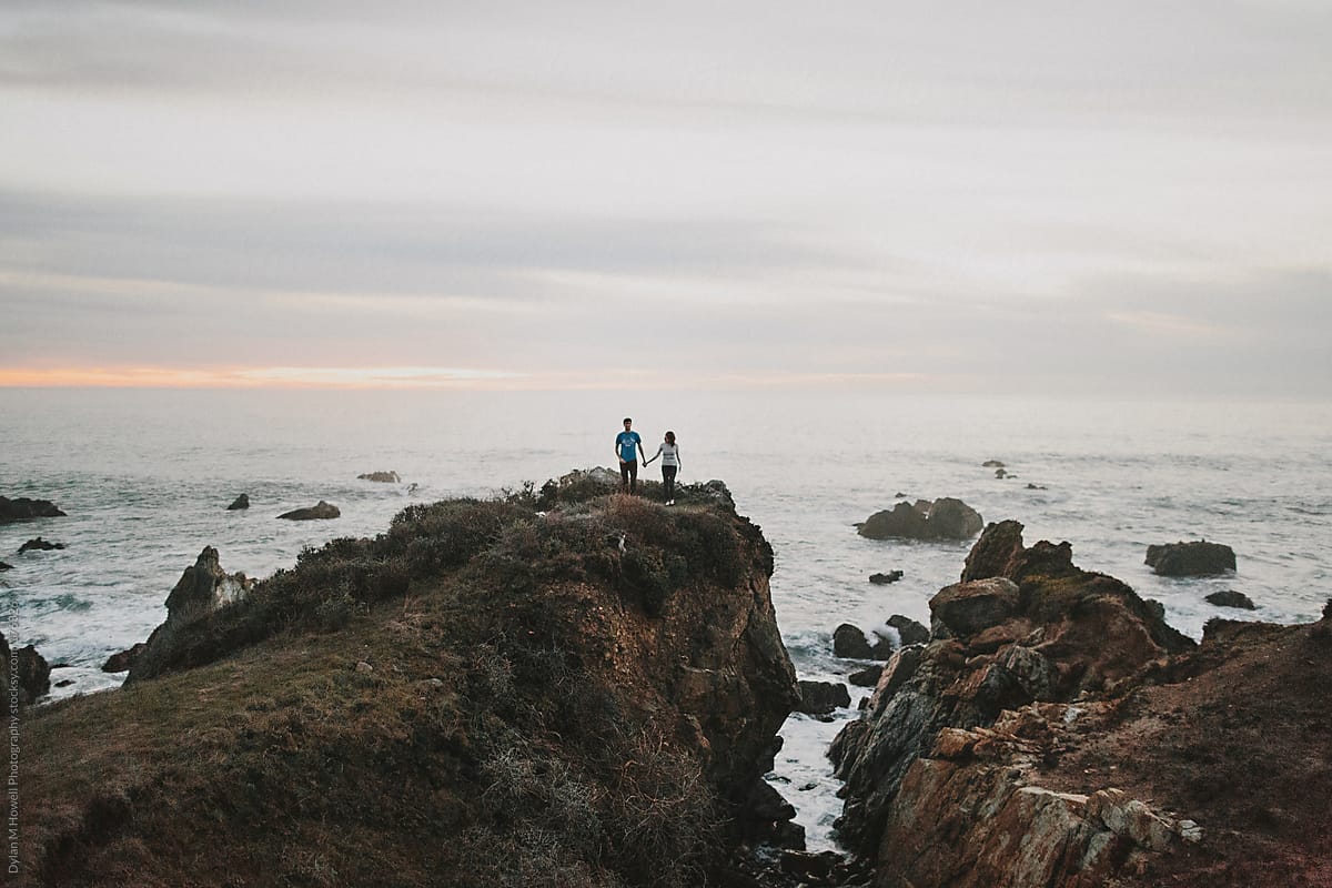 "A Couple Holding Hands On A Sea Cliff" by Stocksy Contributor "Dylan M ...
