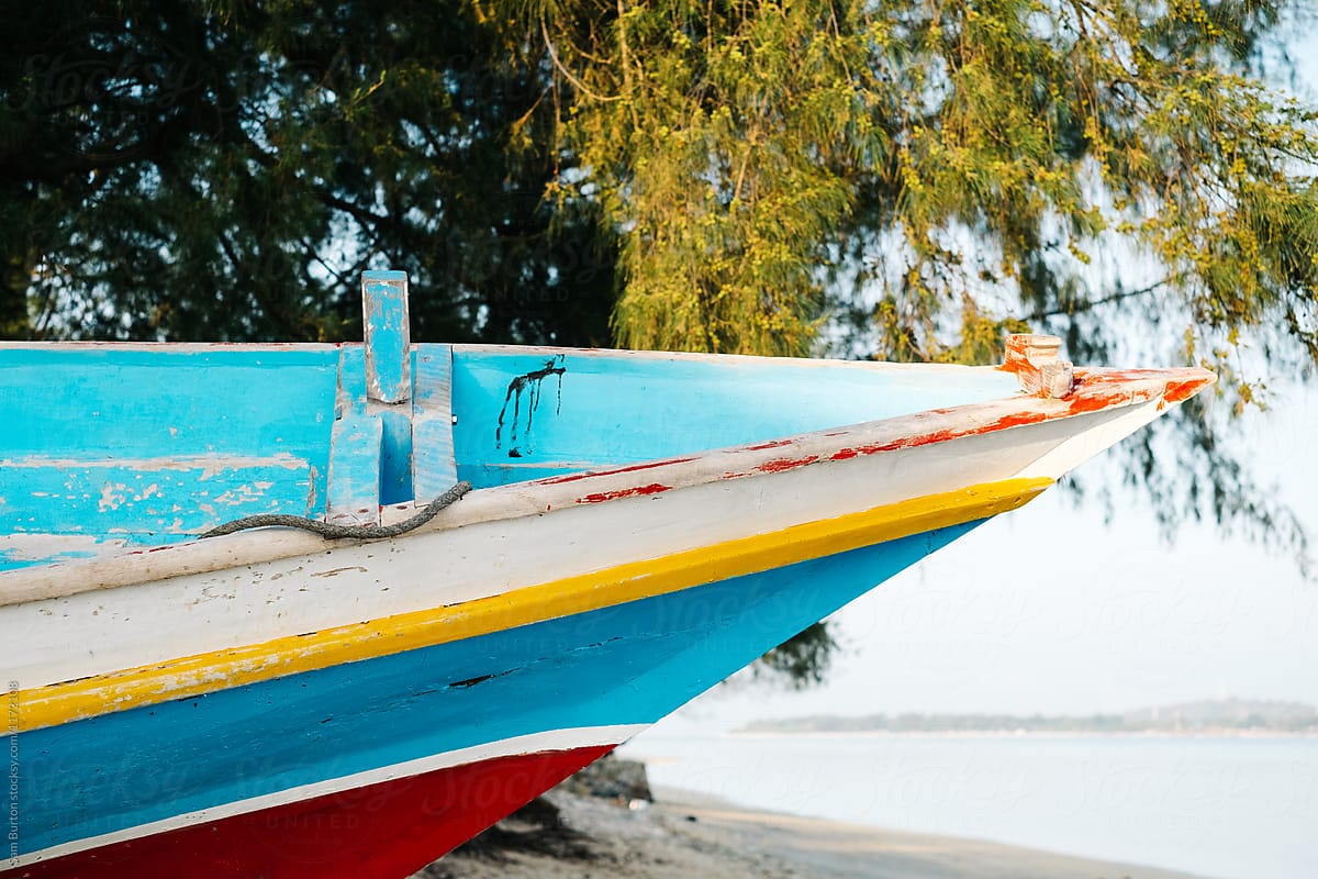 "Painted Boat" by Stocksy Contributor "Sam Burton" - Stocksy