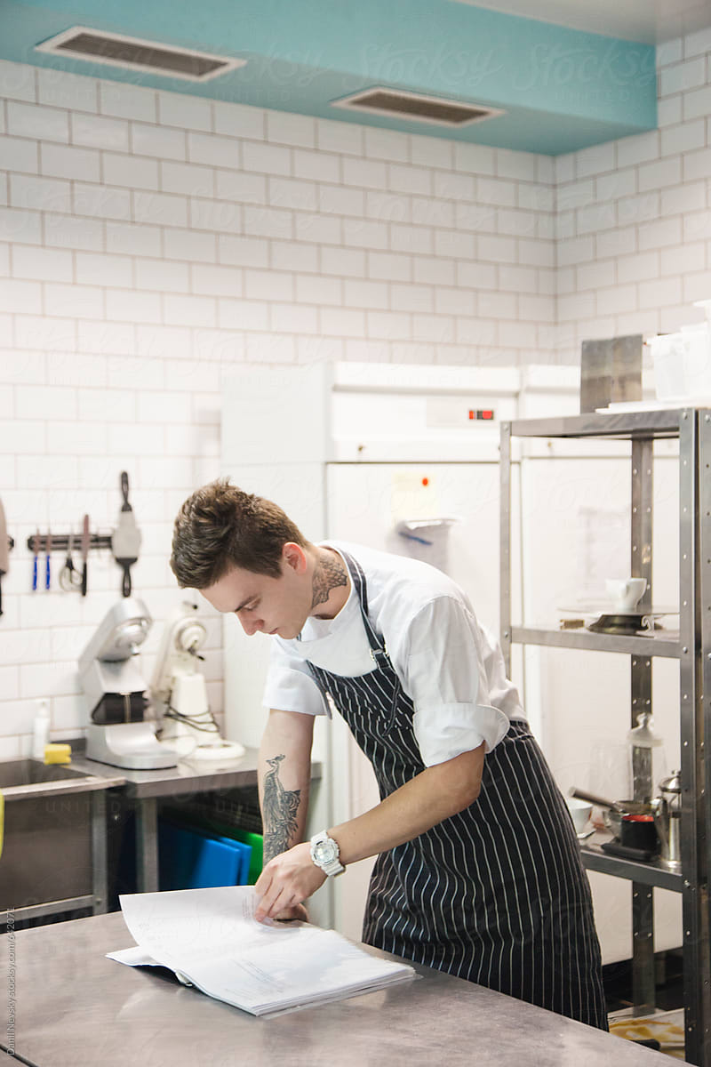 "Young Chef In The Kitchen" by Stocksy Contributor "Danil Nevsky" - Stocksy
