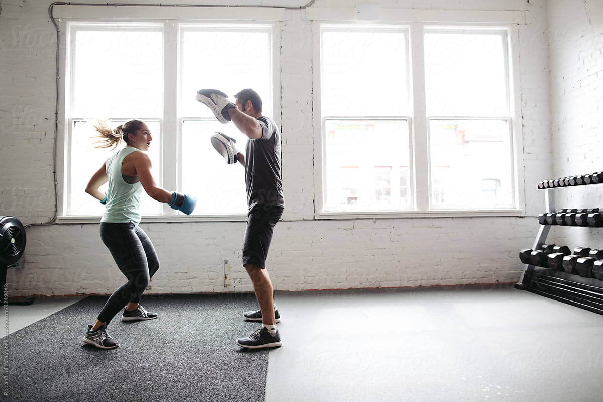 "Strong, Healthy Woman Working Out In Gym - Boxing With Trainer" by ...