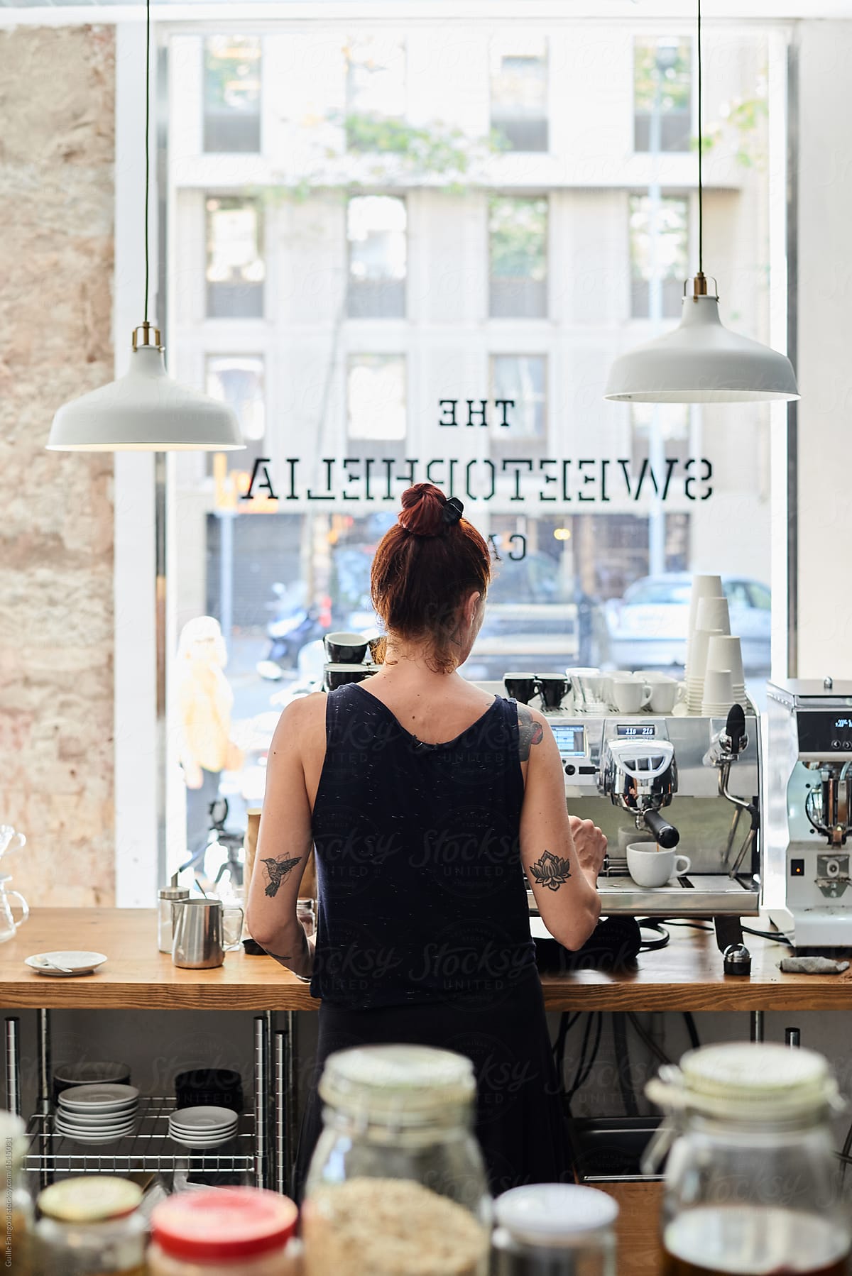 "Rear View Of Tattooed Barista" by Stocksy Contributor "Guille Faingold ...