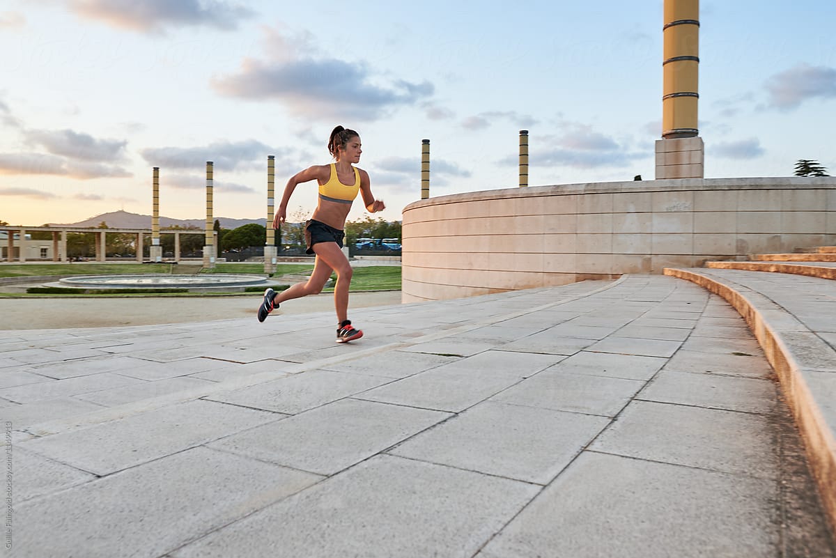 "Athlete Ascending Steps." by Stocksy Contributor "Guille Faingold ...