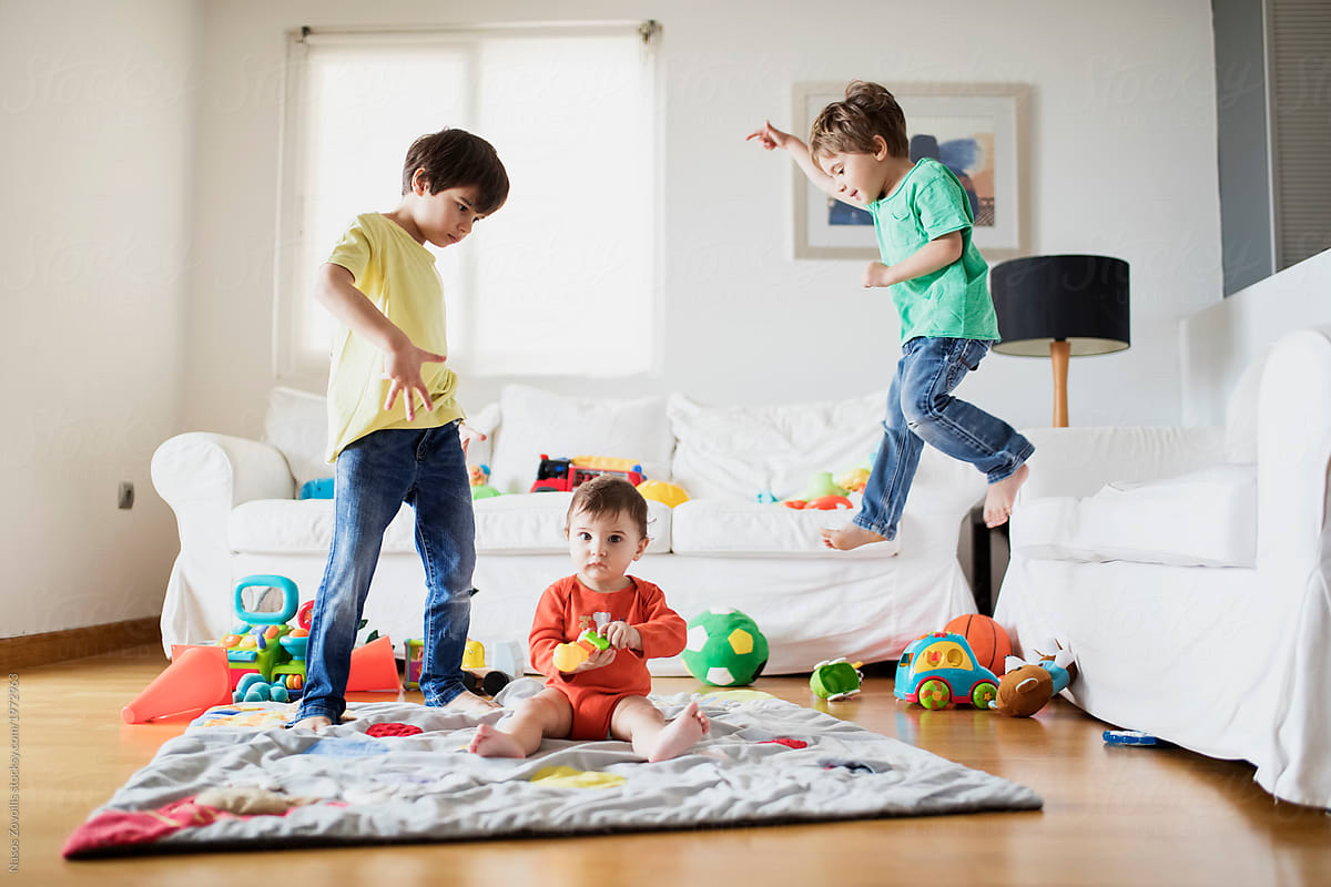 "Kids Playing Around Their Little Brother" by Stocksy Contributor ...
