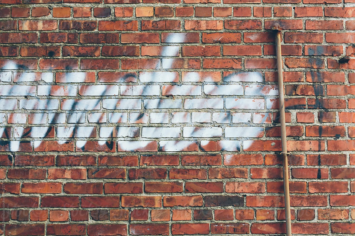 "Graffiti On Brick Building Wall" by Stocksy Contributor "Rialto Images ...