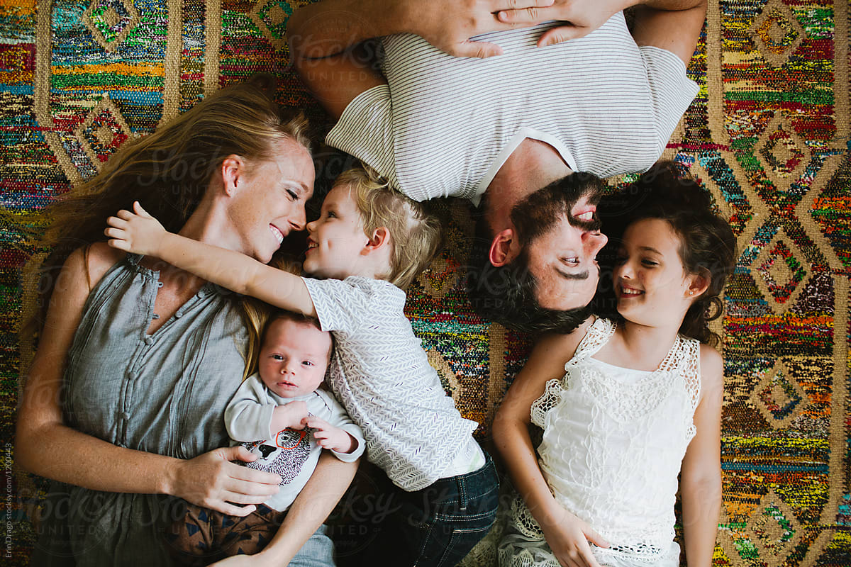 "Family Of 5" by Stocksy Contributor "Erin Drago" - Stocksy