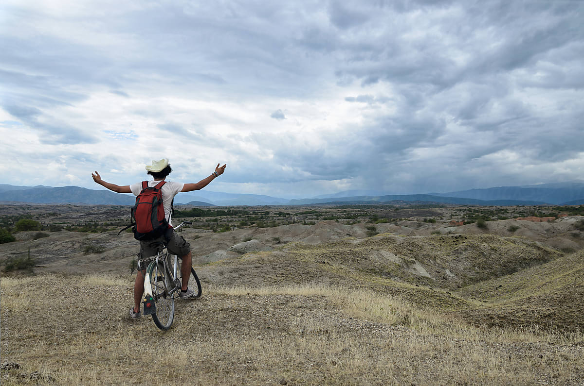 "Traveler On A Bicycle Embracing The View" by Stocksy Contributor ...