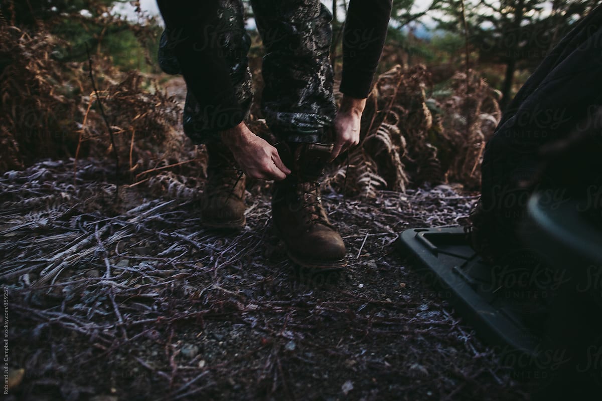 "Hands Tying Boot Laces Outside" by Stocksy Contributor "Rob And Julia ...