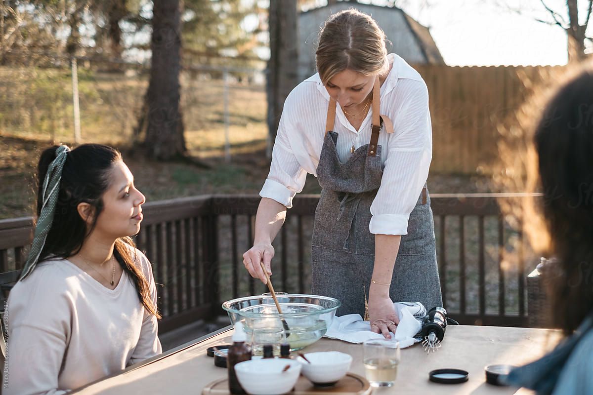 Young women attend a DIY workshop outdoors - Stock Image - Everypixel