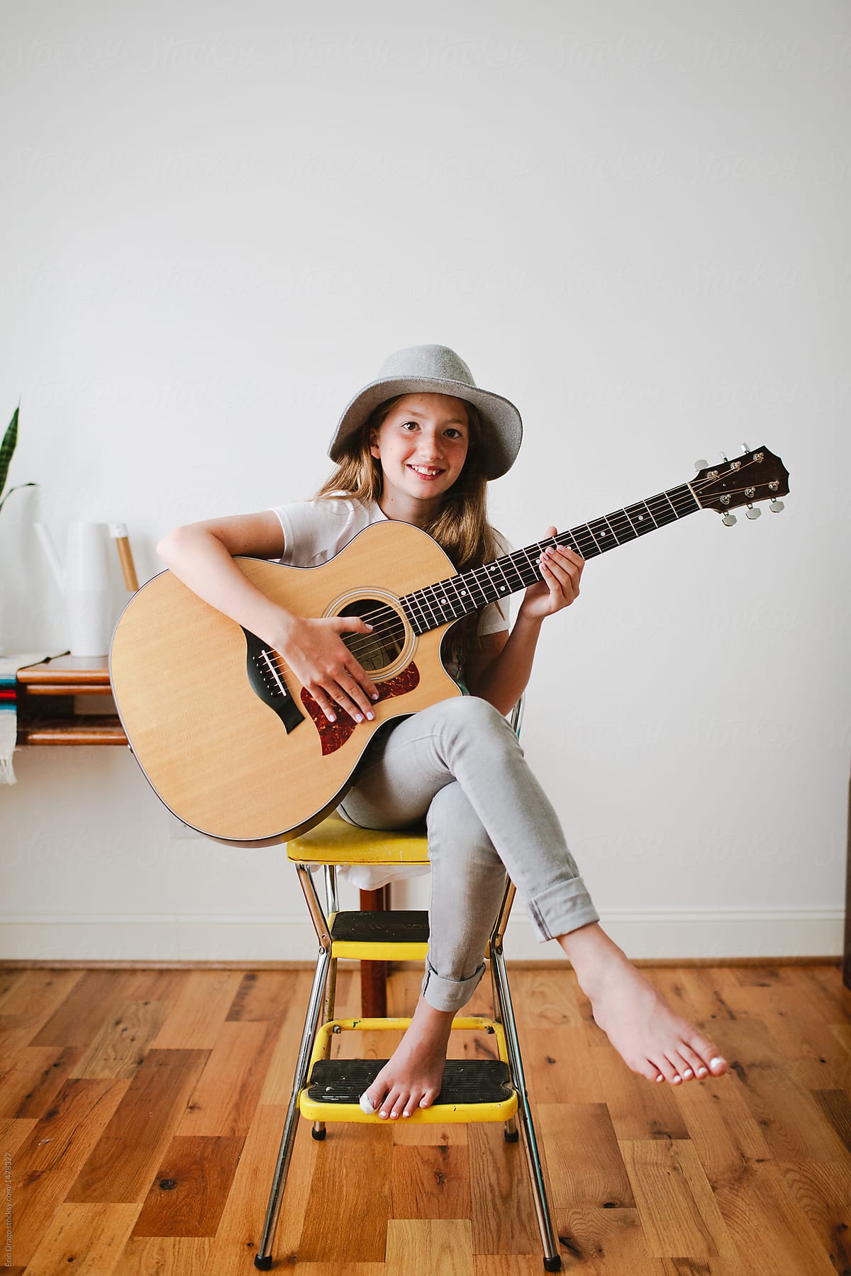  Young Girl Playing Guitar By Stocksy Contributor Erin Drago Stocksy