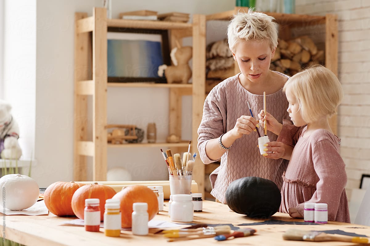 "Pumpkin Painting With Kids" by Stocksy Contributor "Clique Images ...