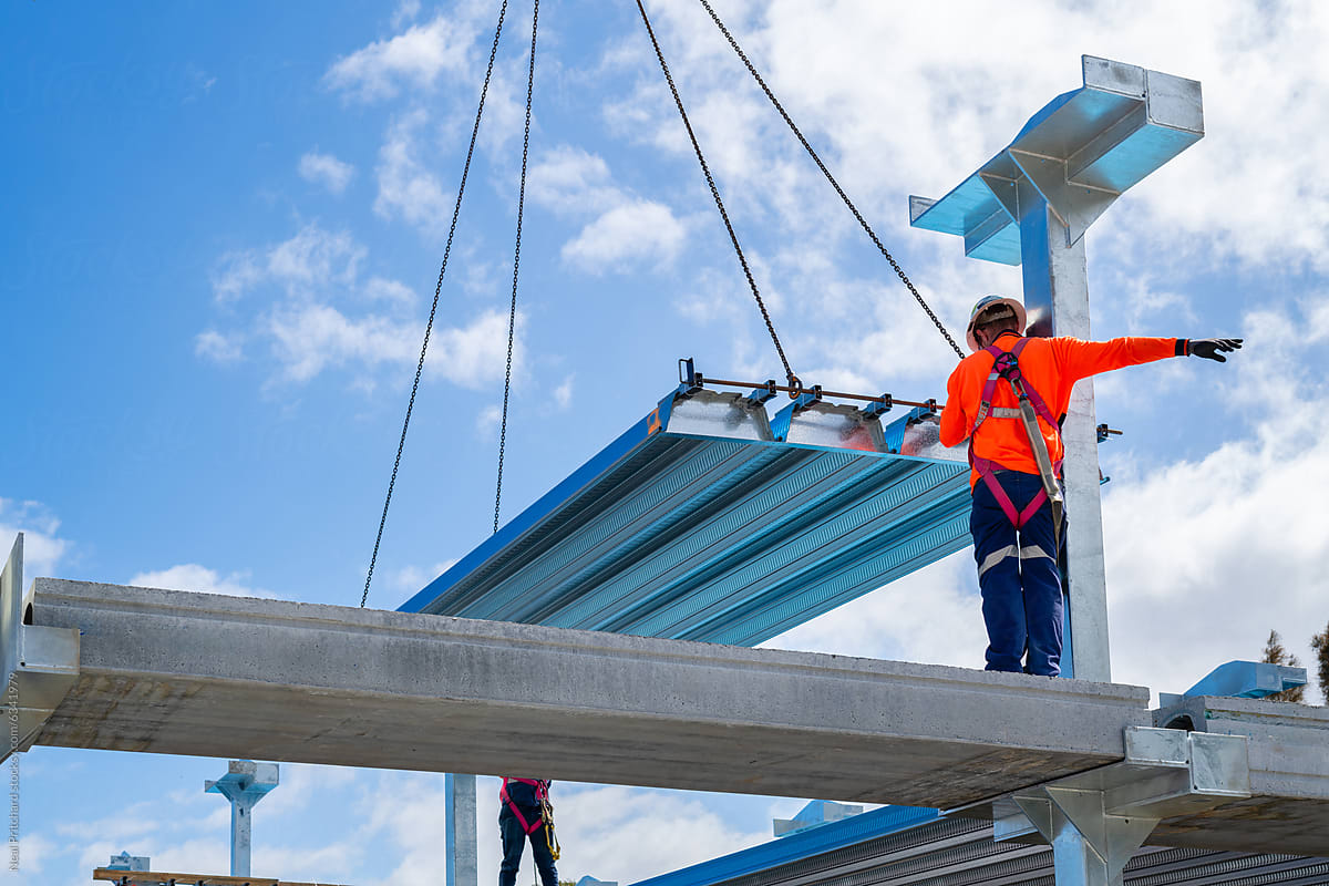"Steel Workers On Construction Site" by Stocksy Contributor "Neal ...