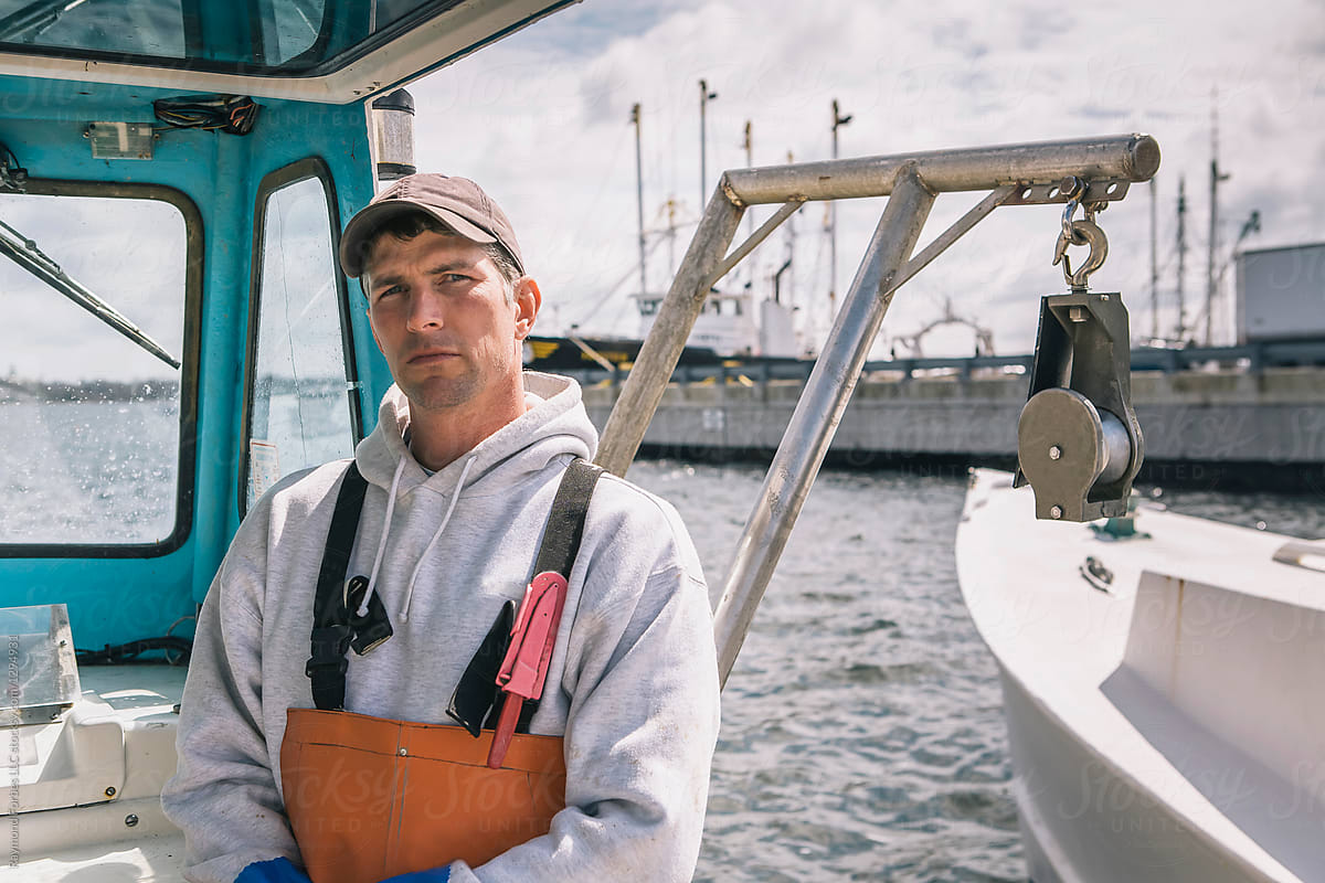 Portrait Of Commercial Fisherman On His Boat In Port By Stocksy Portrait Of Commercial Fisherman On His Boat In Port By Stocksy
