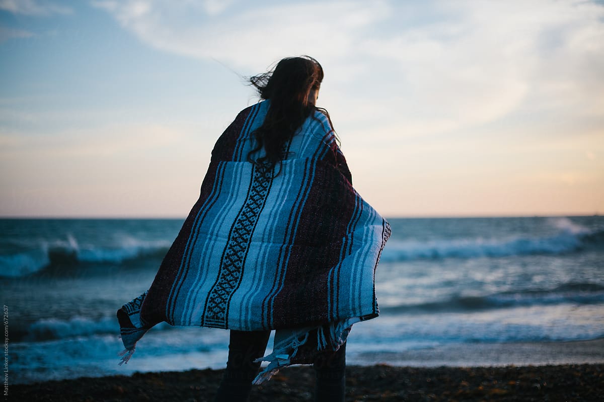 "Beach Walk At Sunset" by Stocksy Contributor "Matthew Linker" - Stocksy