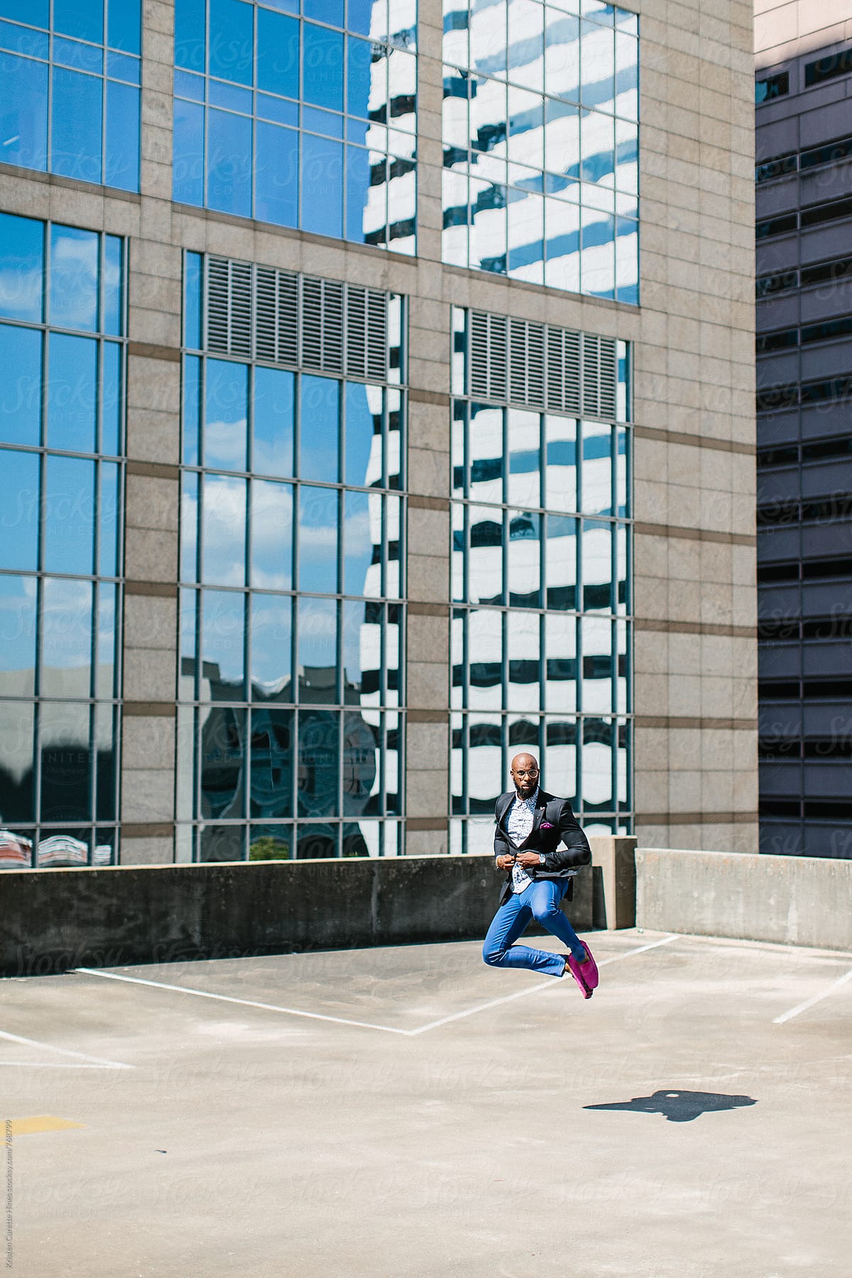 "An African American Man In A Suit Jumping Up And Clicking His Heels ...