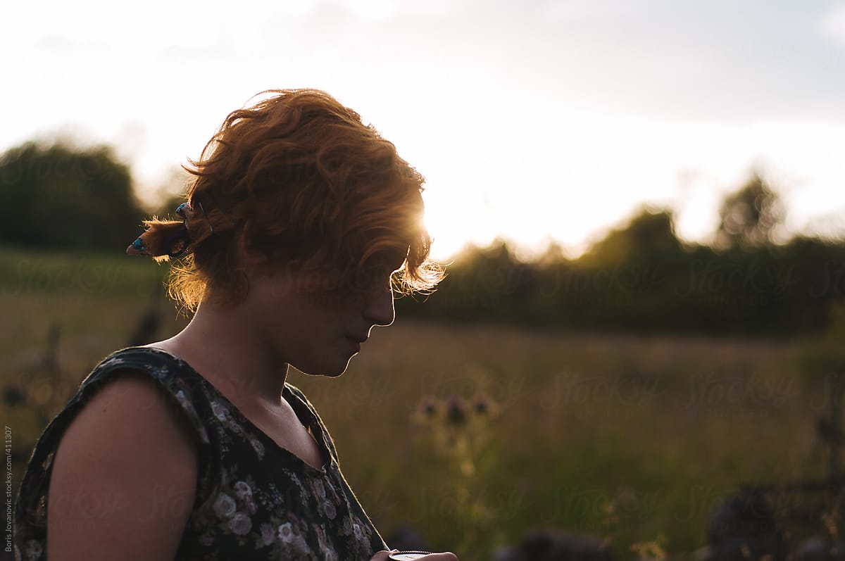 "Portrait Of Ginger Girl In The Field" by Stocksy Contributor "Boris ...